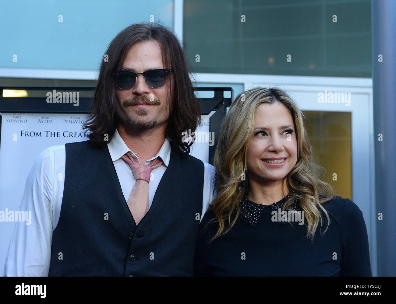 Cast member Mira Sorvino and her husband, actor Christopher Backus ...