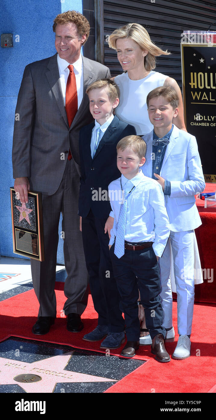 Actor Will Ferrell holds poses with his wife Viveca Paulin and the sons ...