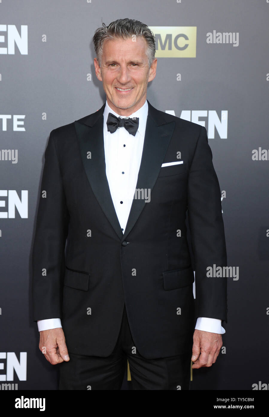 Christopher Stanley arrives on the red carpet of the Black & Red Ball ...