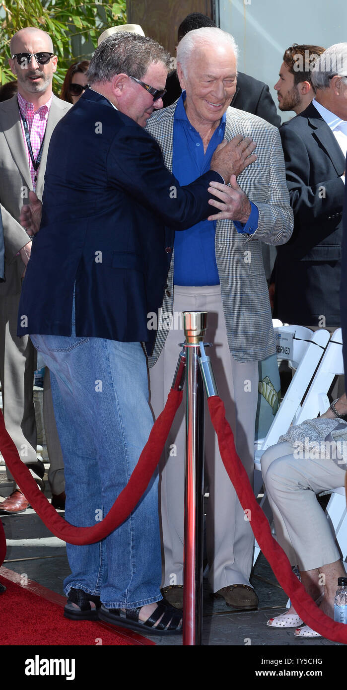 Actors William Shatner and Christopher Plummer participate in a hand ...