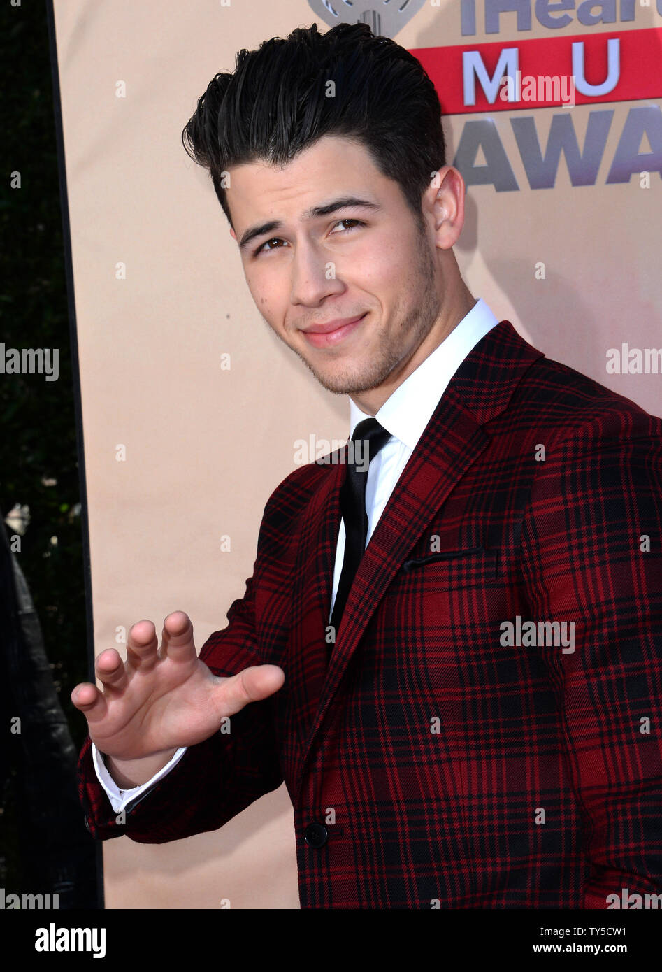Singer Nick Jonas attends the iHeartRadio Music Awards at the Shrine ...