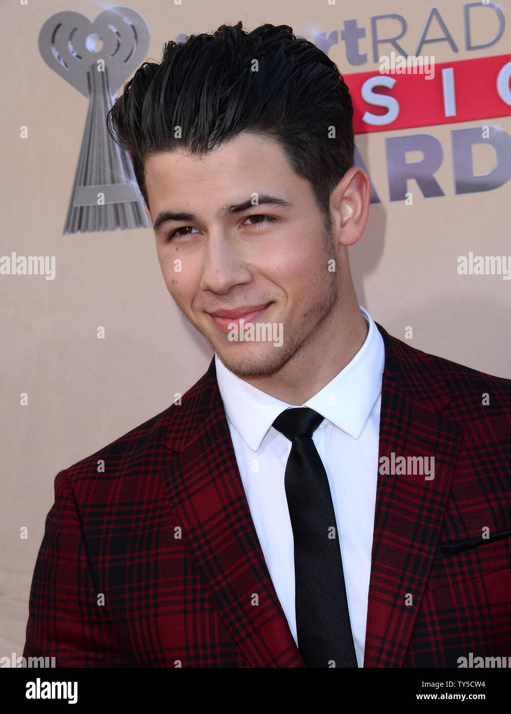Singer Nick Jonas attends the iHeartRadio Music Awards at the Shrine ...