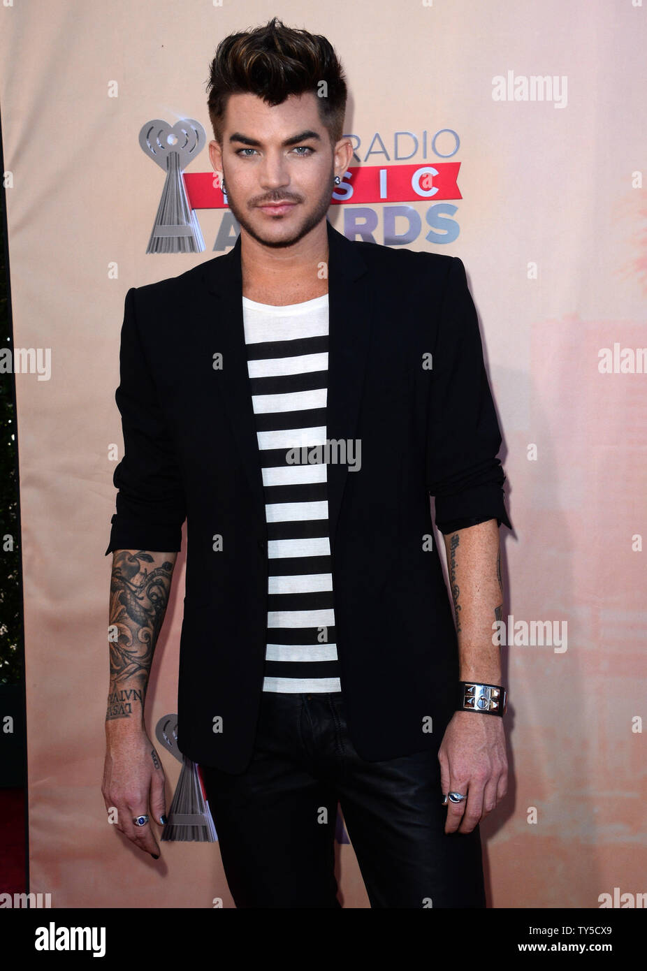 Singer Adam Lambert attends the iHeartRadio Music Awards at the Shrine ...