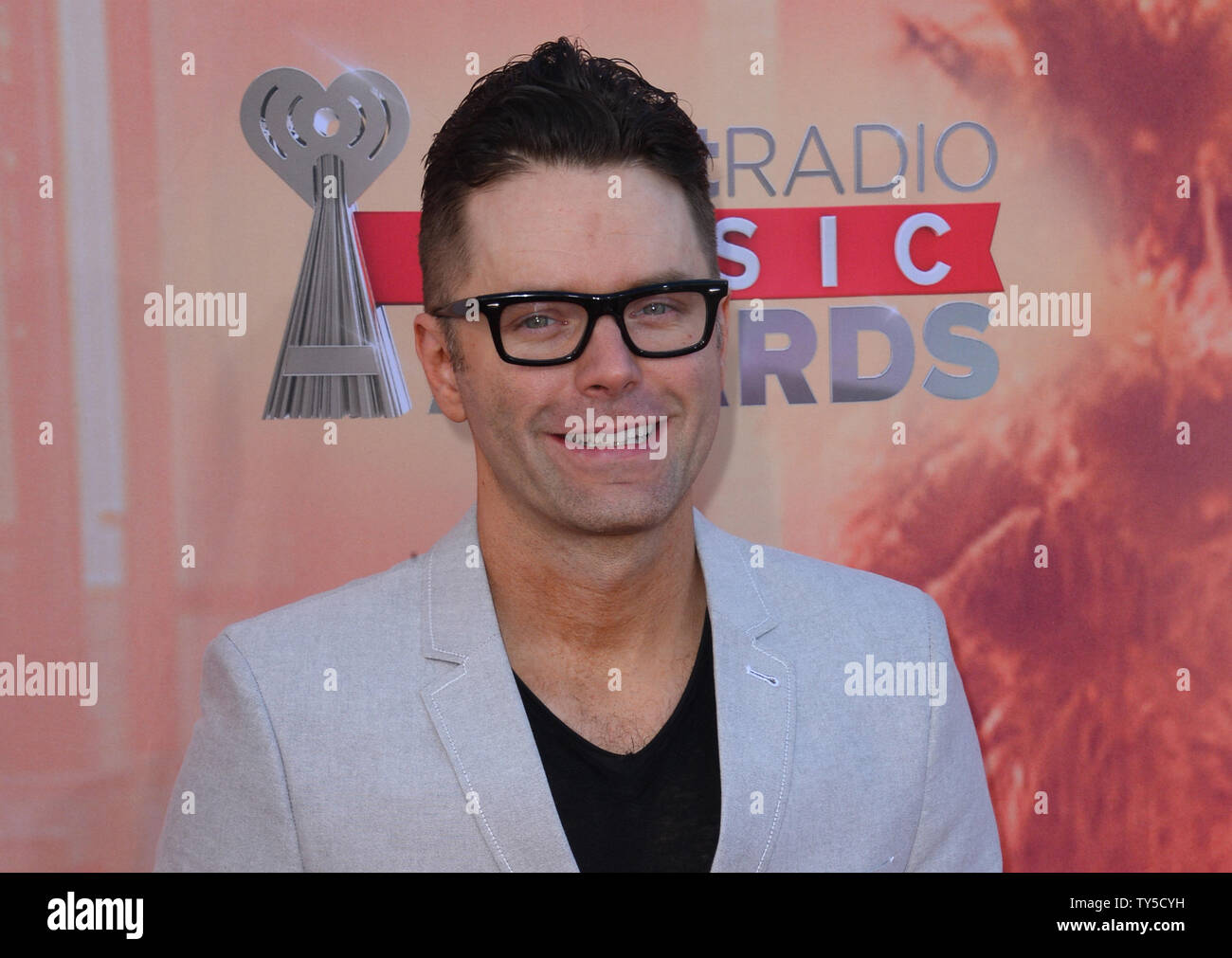 Radio broadcaster Bobby Bones attends the iHeartRadio Music Awards at ...