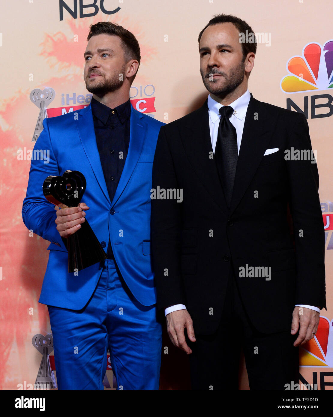 Justin Timberlake, winner of the iHeartRadio Innovator award, left, and ...