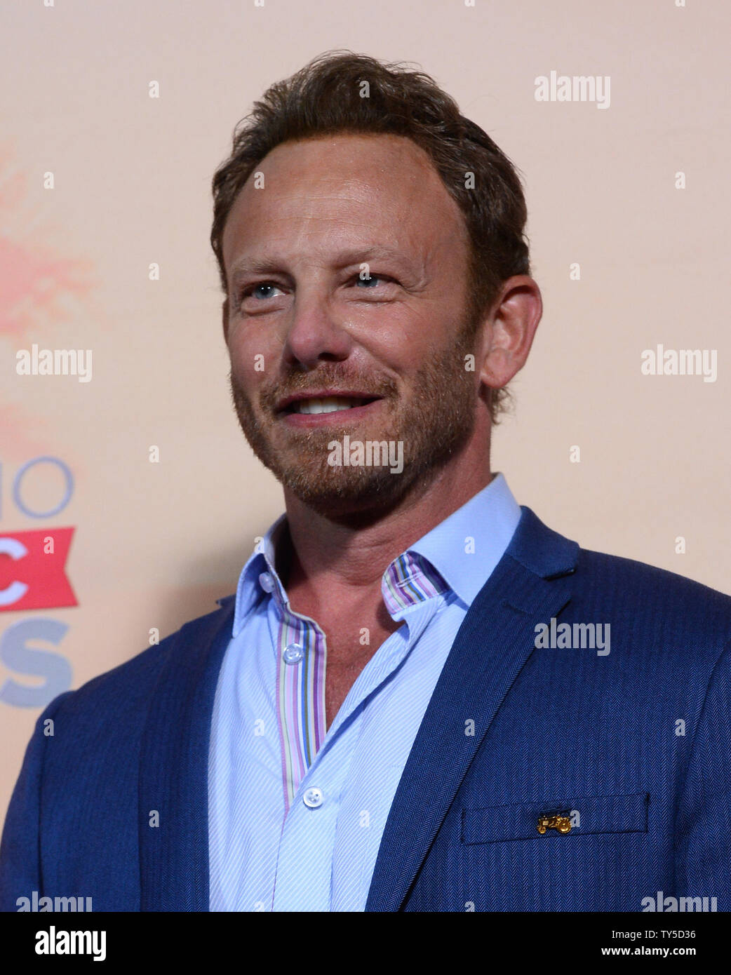 Actor Ian Ziering poses backstage at the iHeartRadio Music Awards at ...