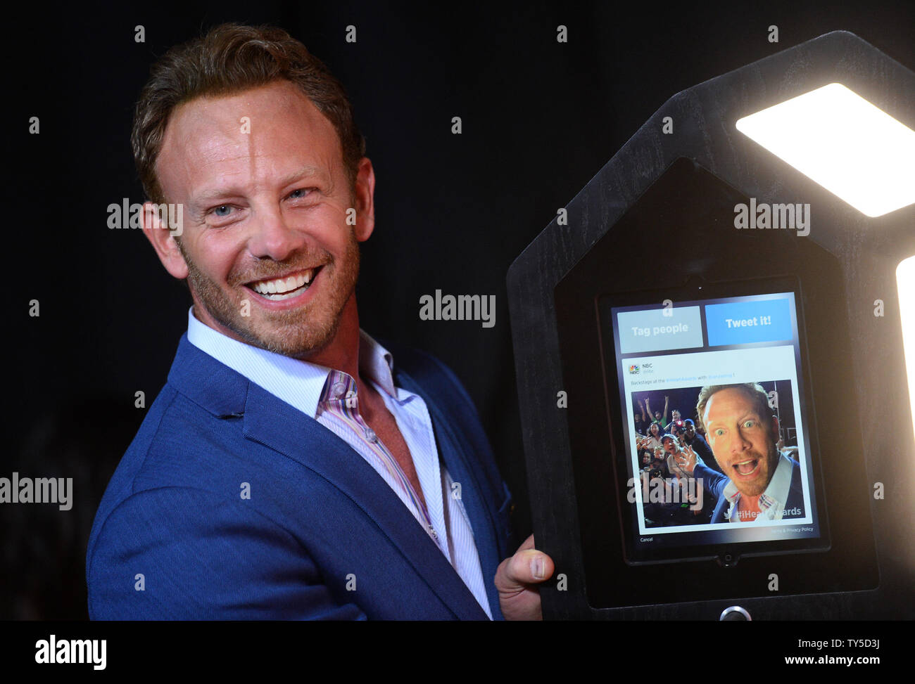 Actor Ian Ziering is seen backstage at the iHeartRadio Music Awards at ...