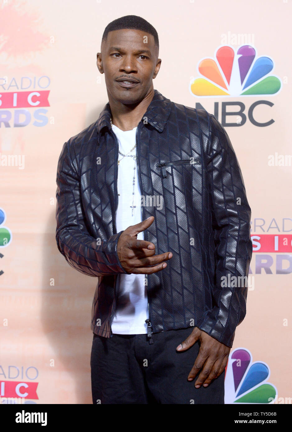 Actor Jamie Foxx poses backstage at the iHeartRadio Music Awards at the ...