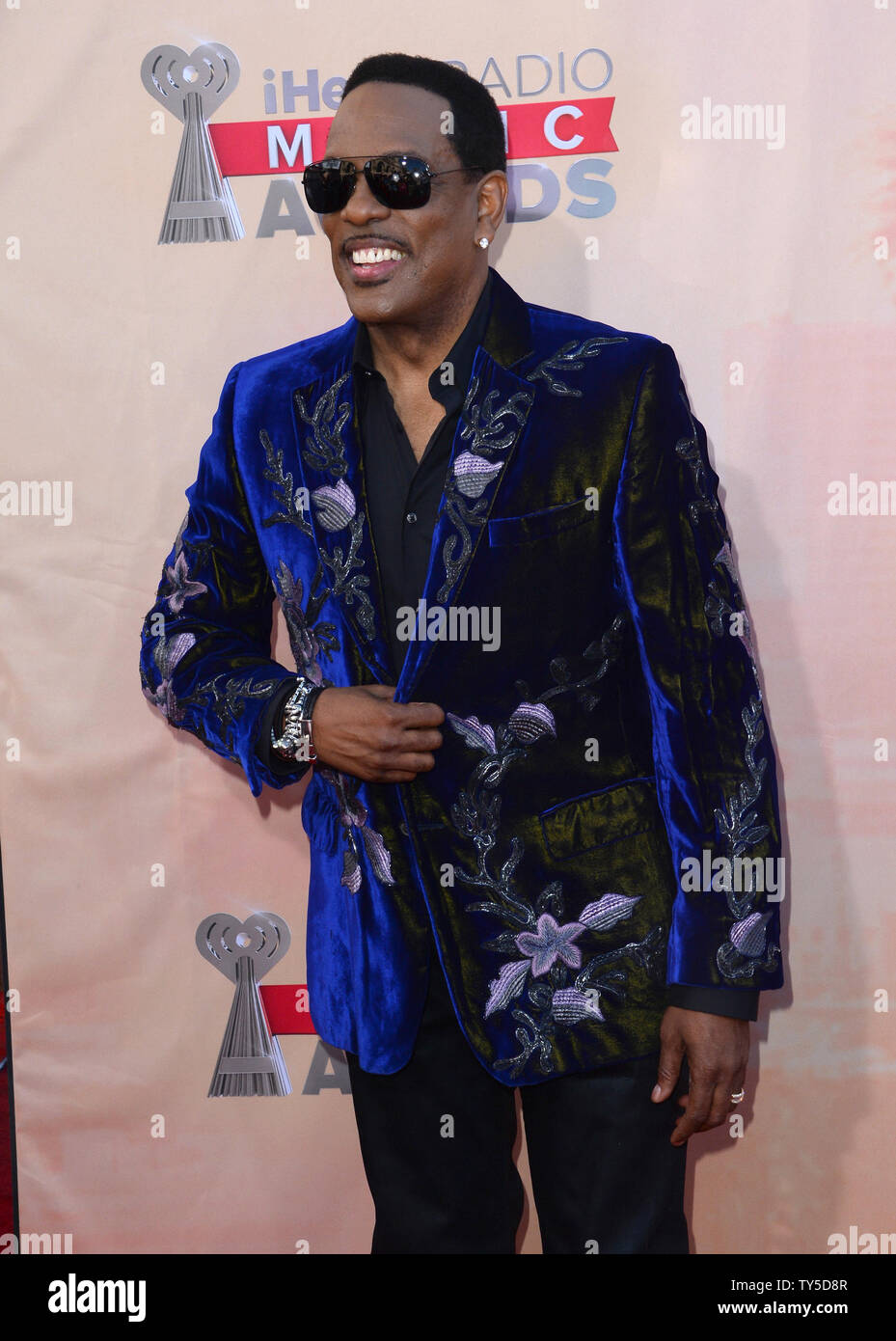 Singer Charlie Wilson attends the iHeartRadio Music Awards at the ...