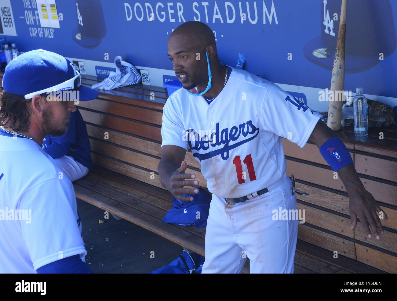 Los Angeles Dodgers' short stop Jimmy Rollins (11) and teammate Yasmani ...