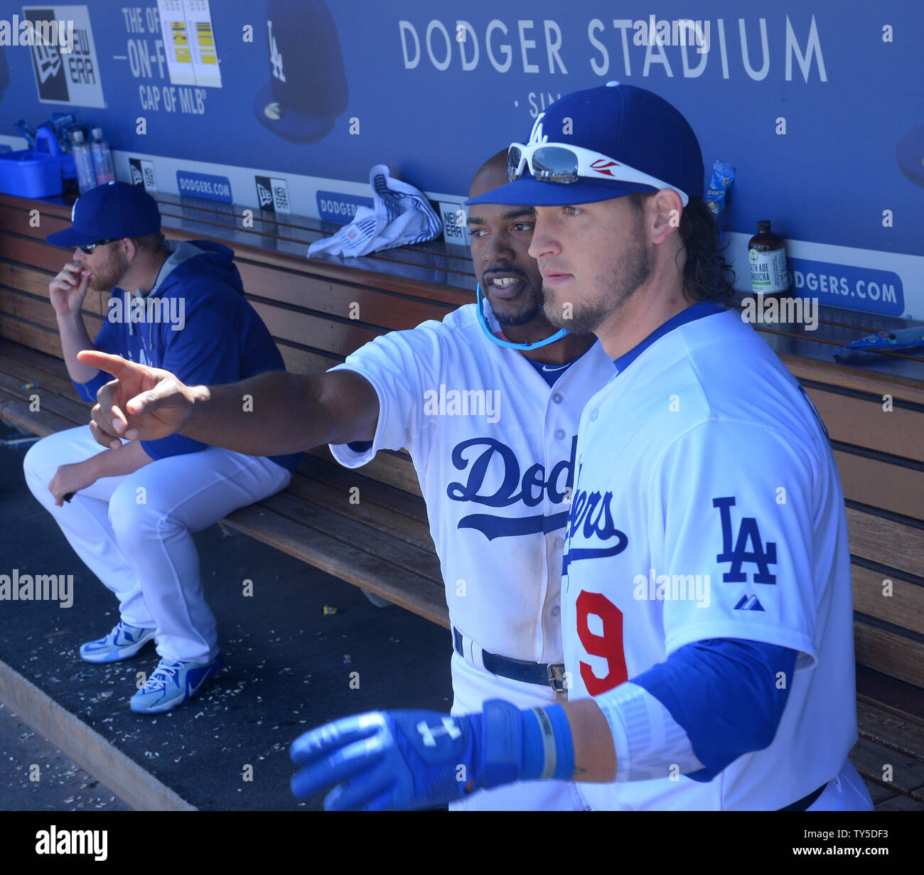 Los Angeles Dodgers' short stop Jimmy Rollins (11) and teammate Yasmani ...