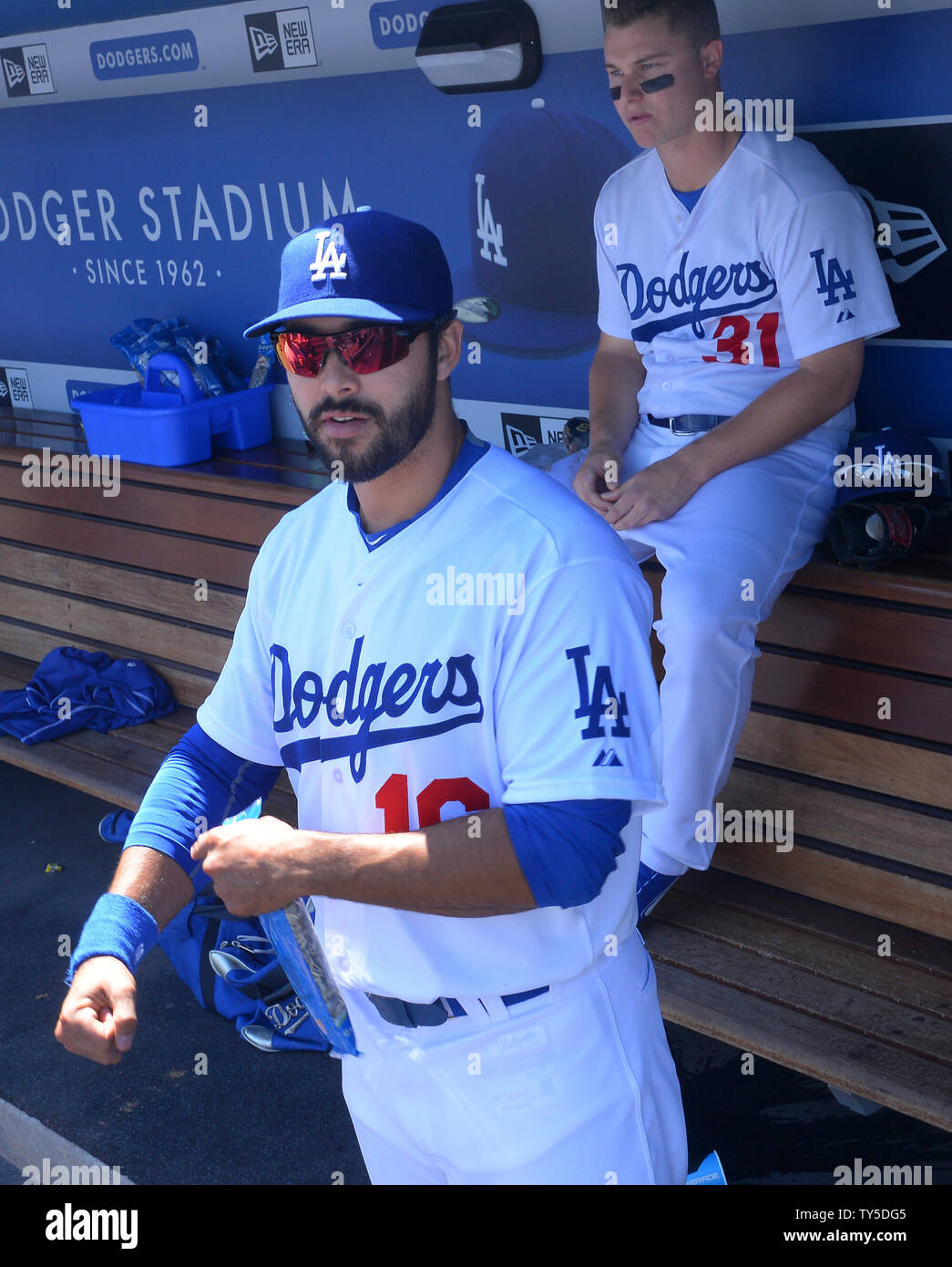 Los Angeles Dodgers' outfielders Andre Ethier (L) and Joc Pederson gather in the dugout prior to ...