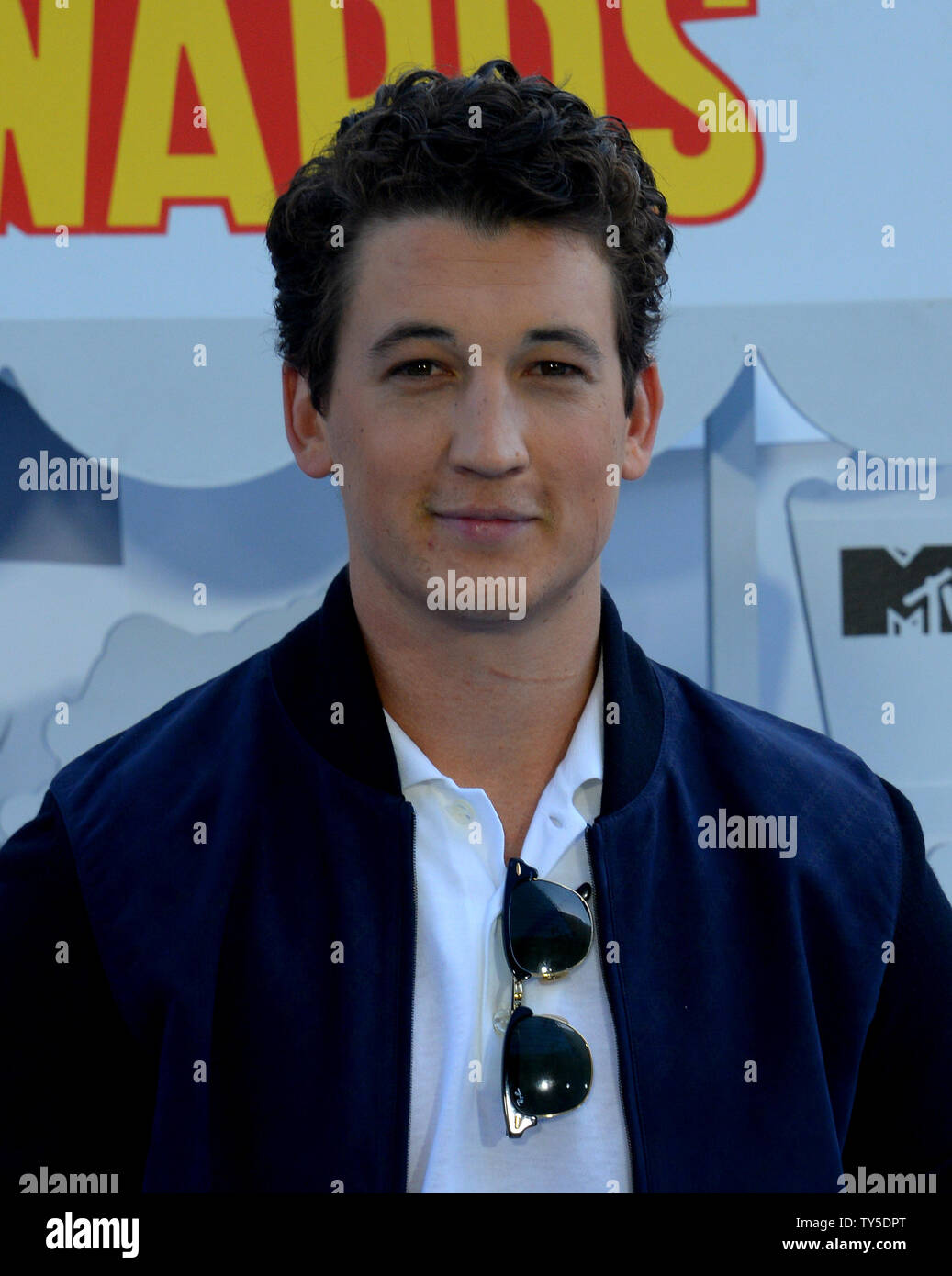 Actor Miles Teller arrives for the MTV Movie Awards at Nokia Theatre L ...