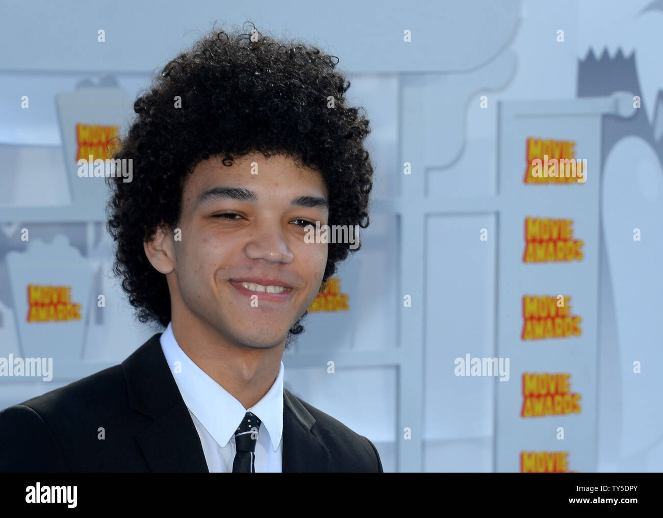Actor Justice Smith arrives for the MTV Movie Awards at Nokia Theatre L ...