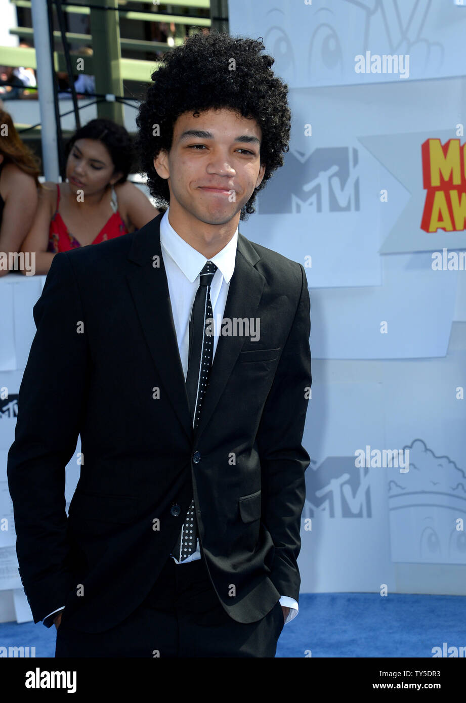 Actor Justice Smith arrives for the MTV Movie Awards at Nokia Theatre L ...