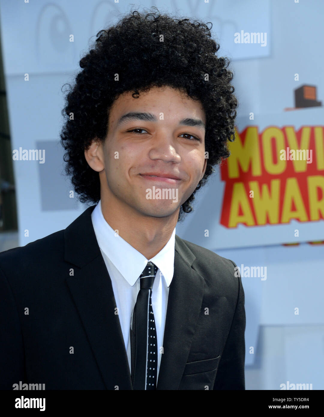 Actor Justice Smith arrives for the MTV Movie Awards at Nokia Theatre L ...