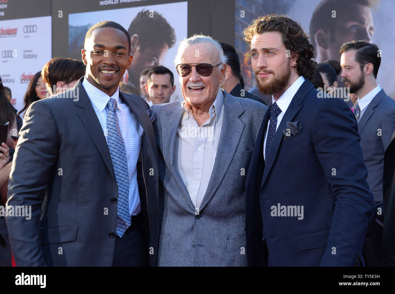 (L-R) Anthony Mackie, Stan Lee and Aaron Taylor-Johnson arrive for the ...