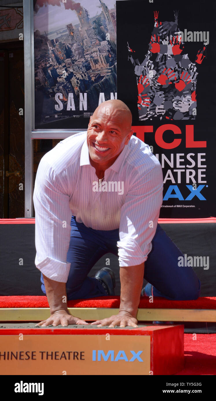 Actor Dwayne "The Rock" Johnson participates in a hand & footprint ...