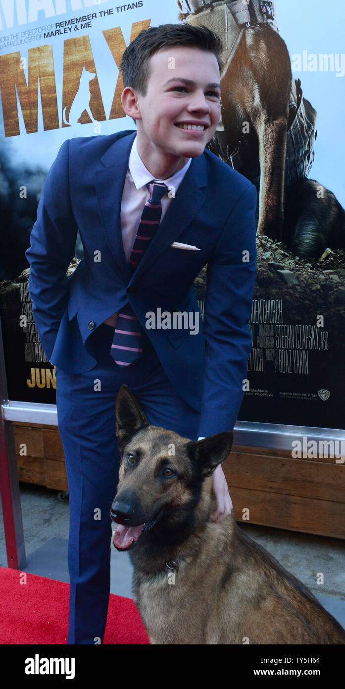 Cast member Josh Wiggins and Max attend the premiere of the family ...