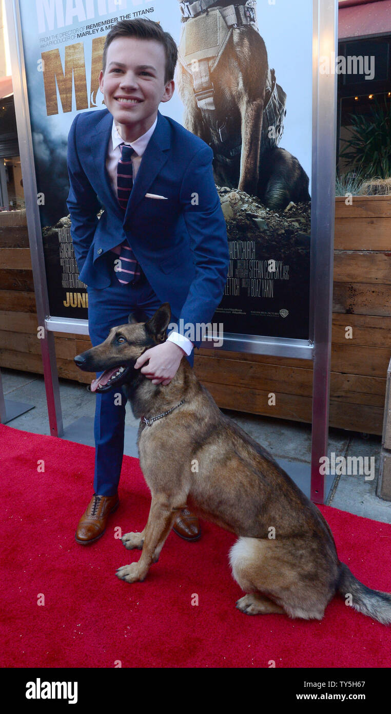 Cast member Josh Wiggins and Max attend the premiere of the family ...