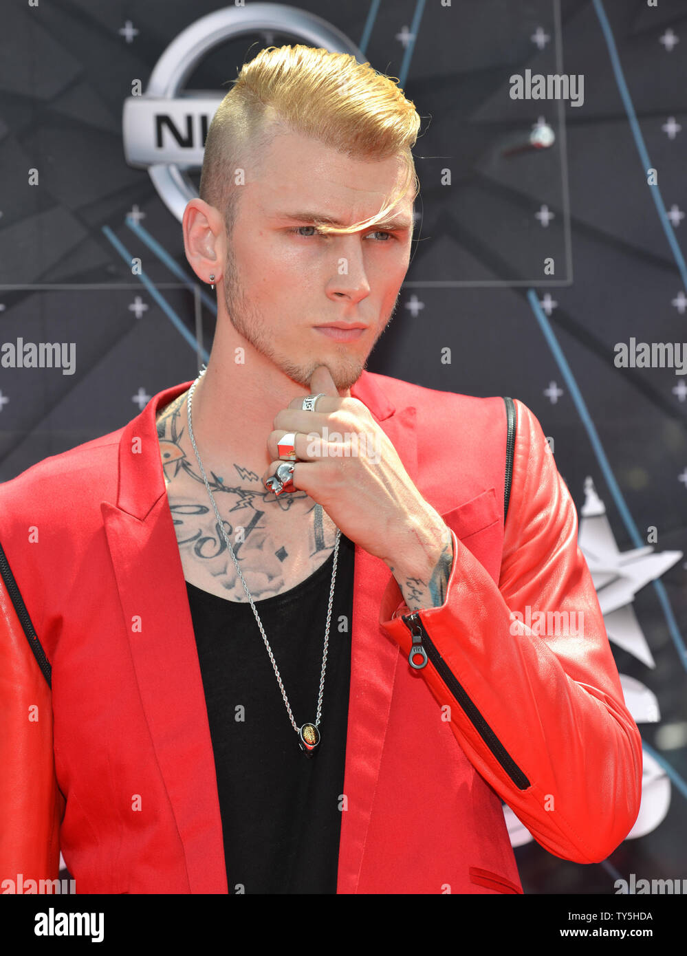 Musician Machine Gun Kelly attends the 15th annual BET Awards at ...
