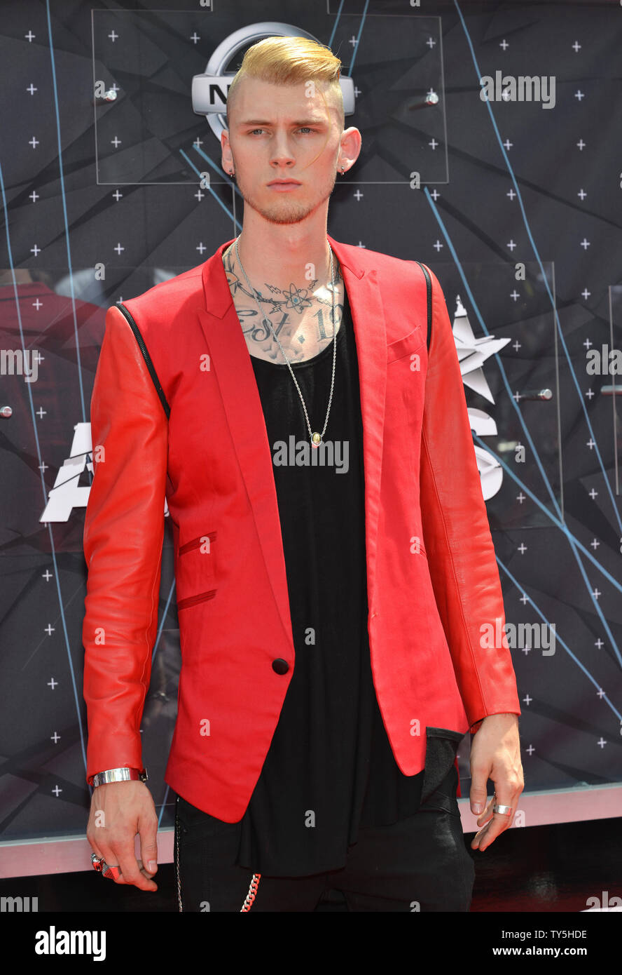 Musician Machine Gun Kelly attends the 15th annual BET Awards at ...