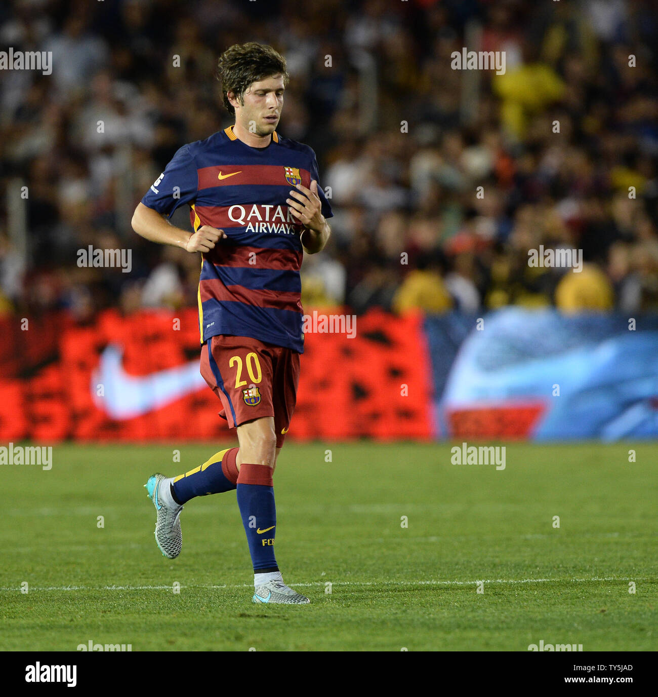 Sergi Roberto #20 of FC Barcelona heads up field after scoring against ...