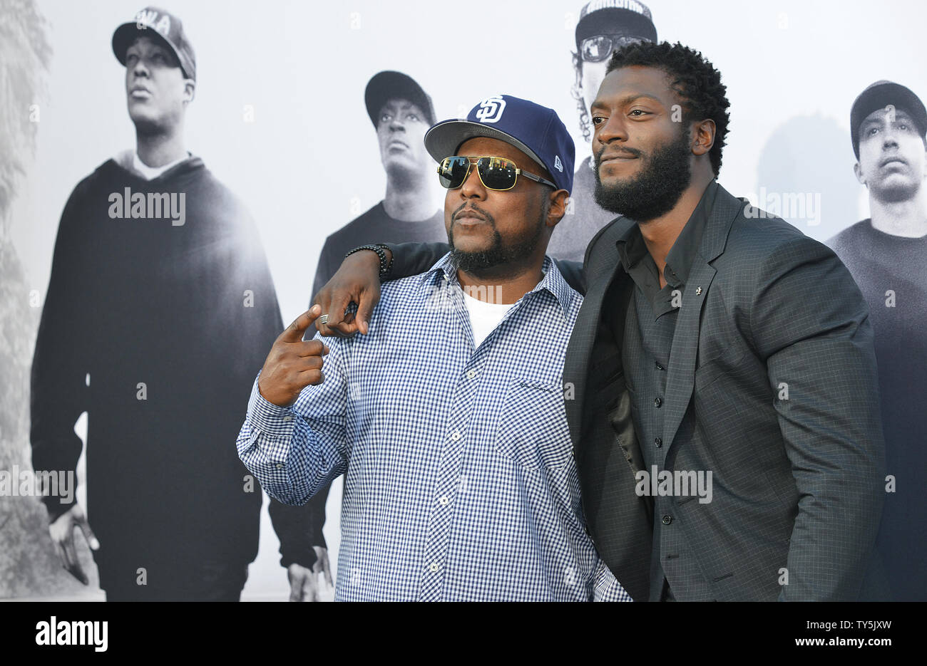 MC Ren (L) and actor Aldis Hodge attend the premiere of the N.W.A ...
