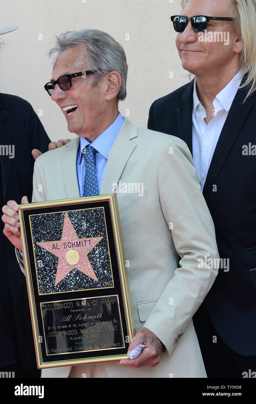 Music pioneer and recording engineer Al Schmitt holds a replica plaque ...