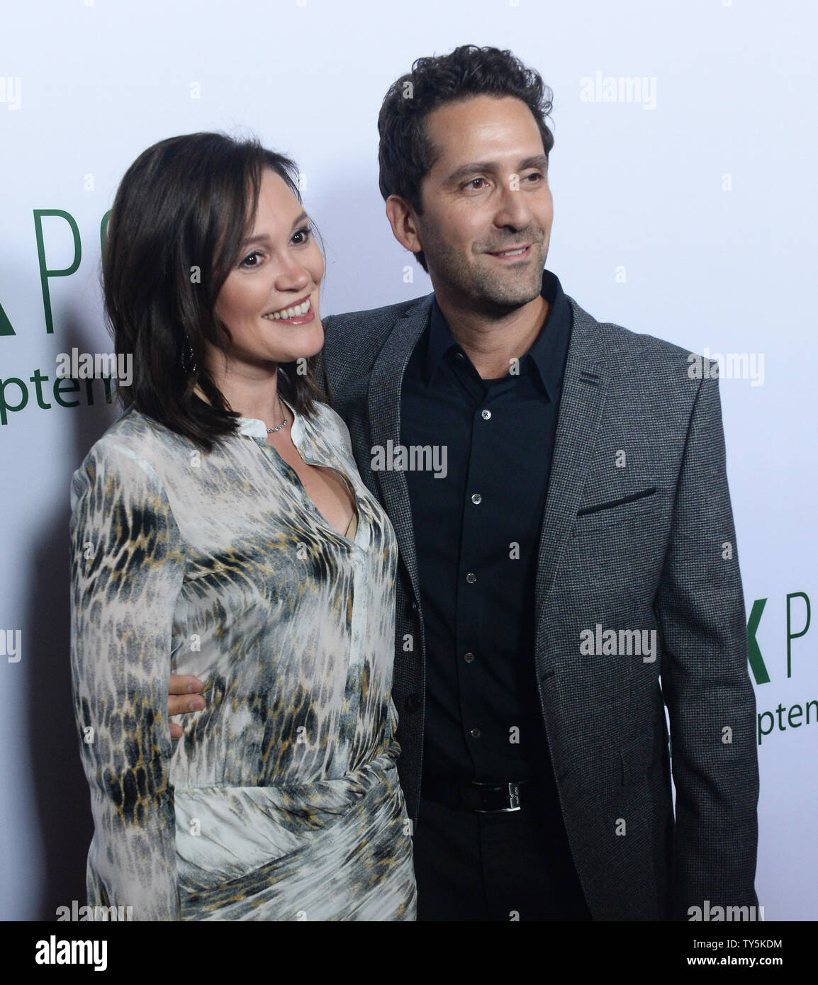 Director Jay Karas and his wife Monica attend the premiere of the ...