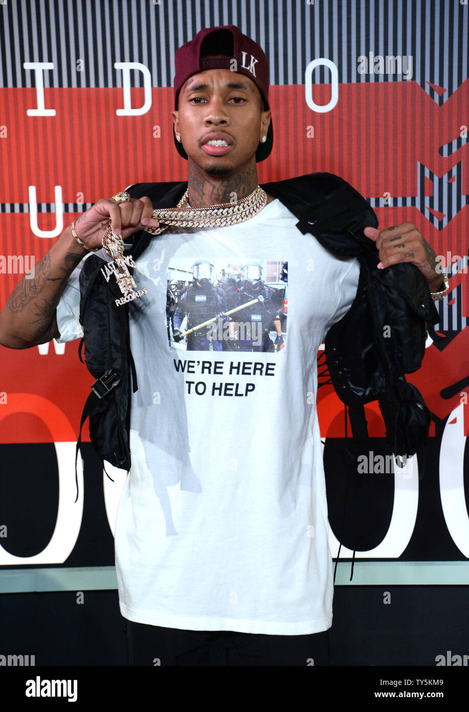 Rapper Tyga arrives on the red carpet for the 32nd annual MTV Video ...