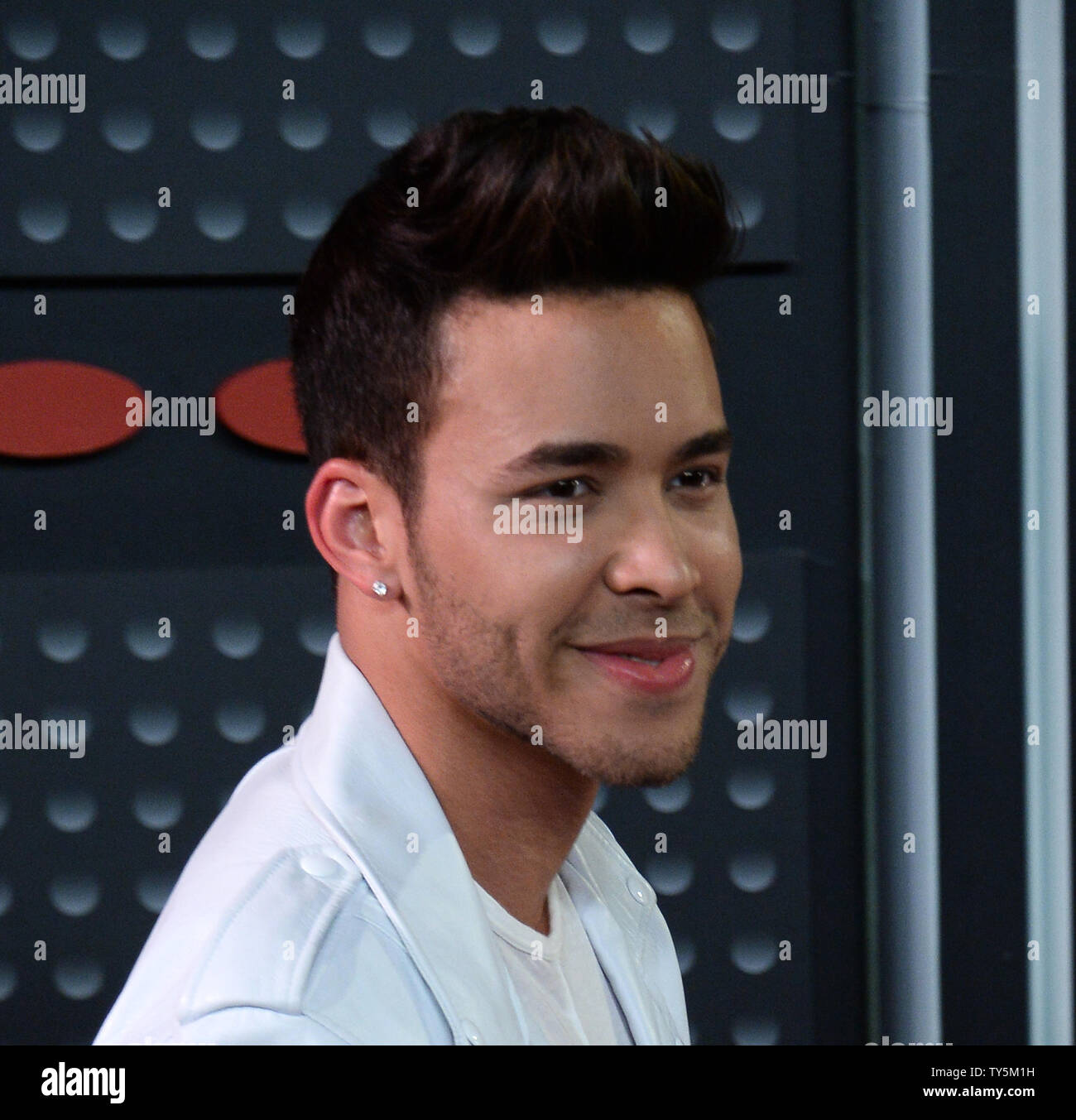 Singer Prince Royce arrives on the red carpet for the 32nd annual MTV ...