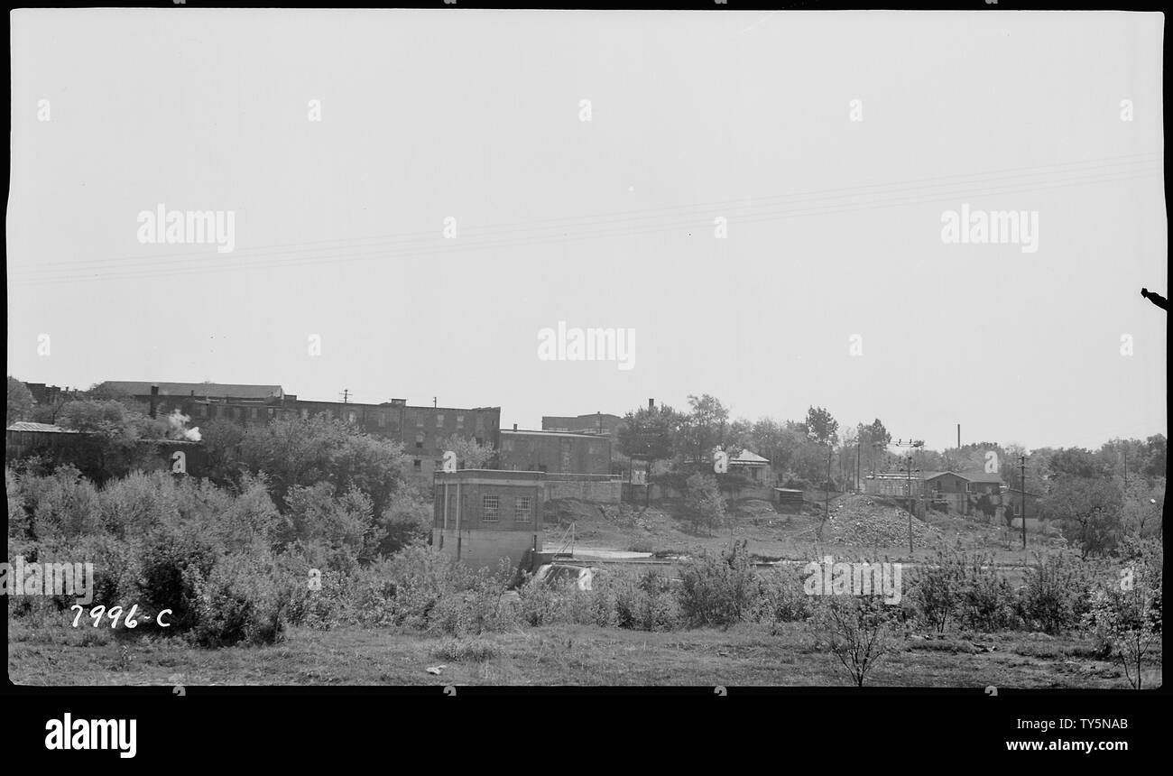 Houses, power plant, storage buildings Stock Photo - Alamy