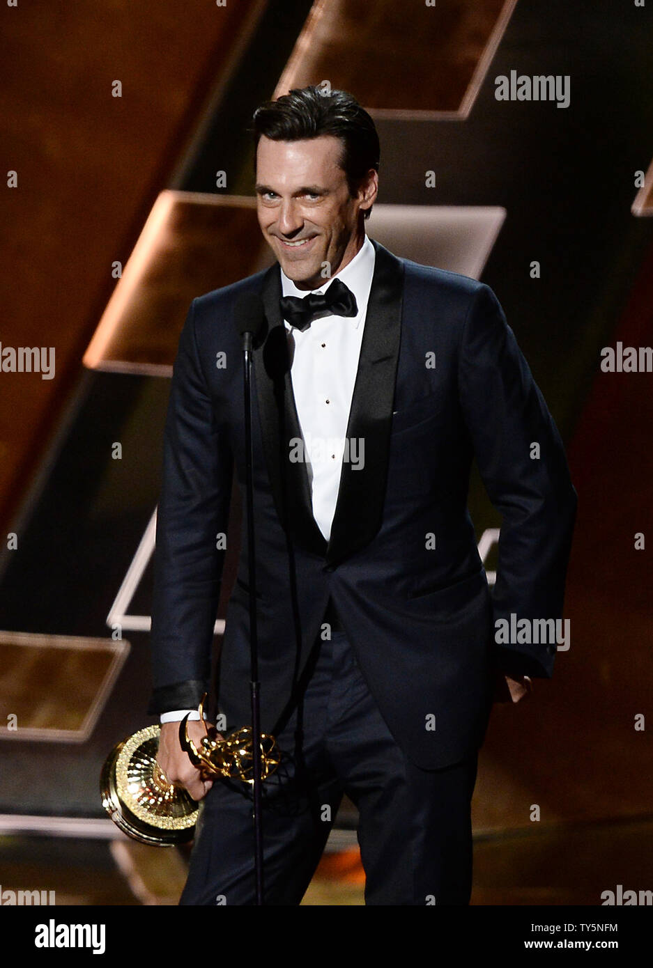 Actor Jon Hamm accepts the award for Outstanding Lead Actor in a Drama ...