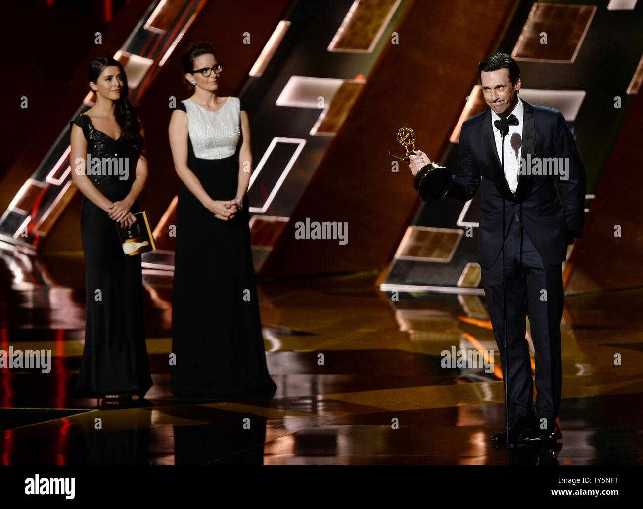Actor Jon Hamm accepts the award for Outstanding Lead Actor in a Drama ...