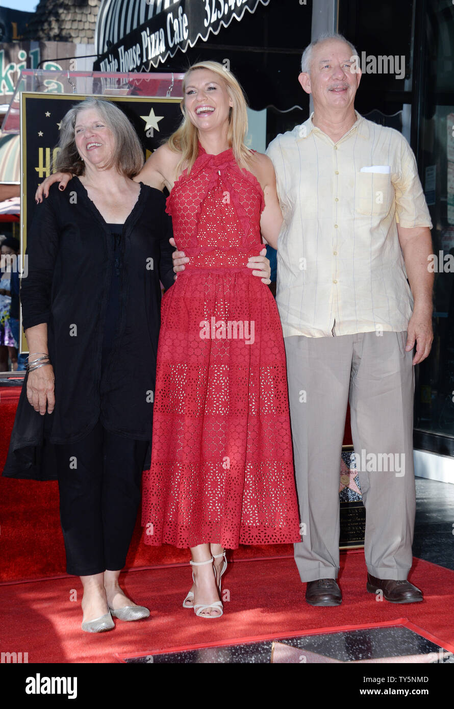 Actress Claire Danes poses with her mother Carla Danes and father ...