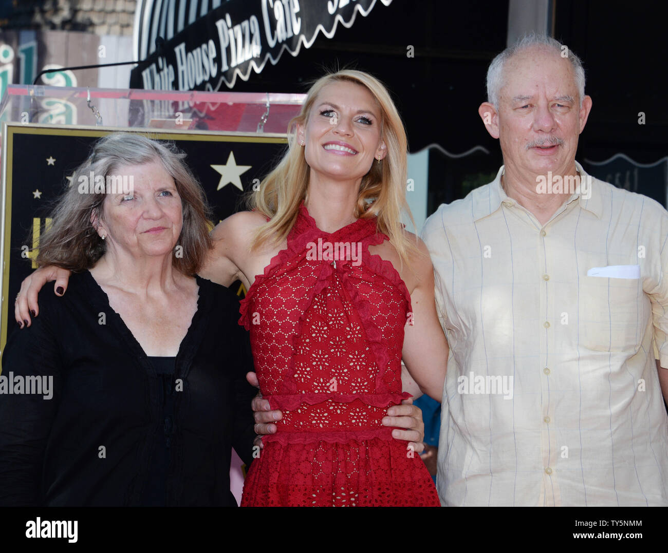 Actress Claire Danes poses with her mother Carla Danes and father ...
