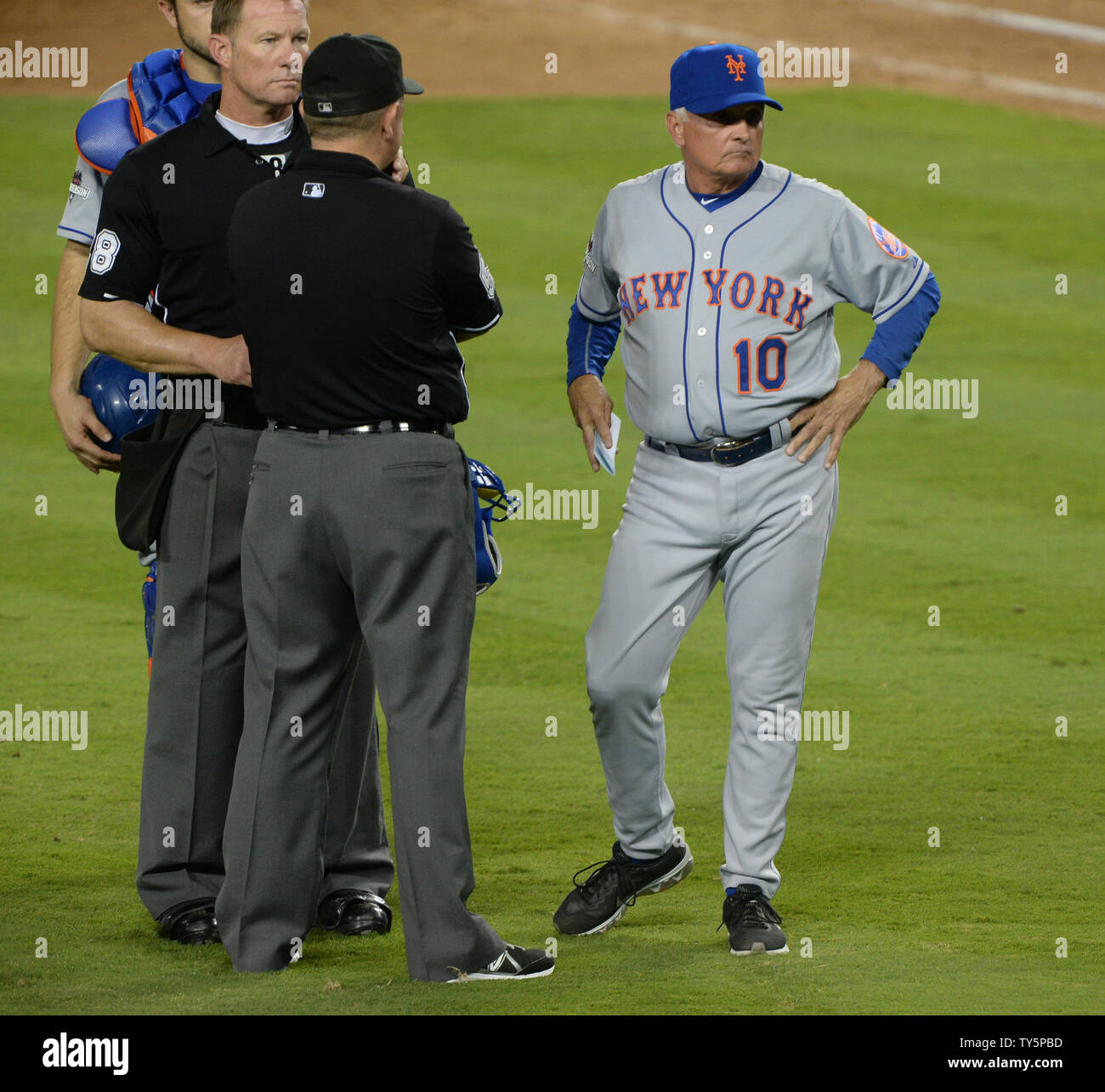 New York Mets' manager Terry Collins is clearly upset as he argues the ...