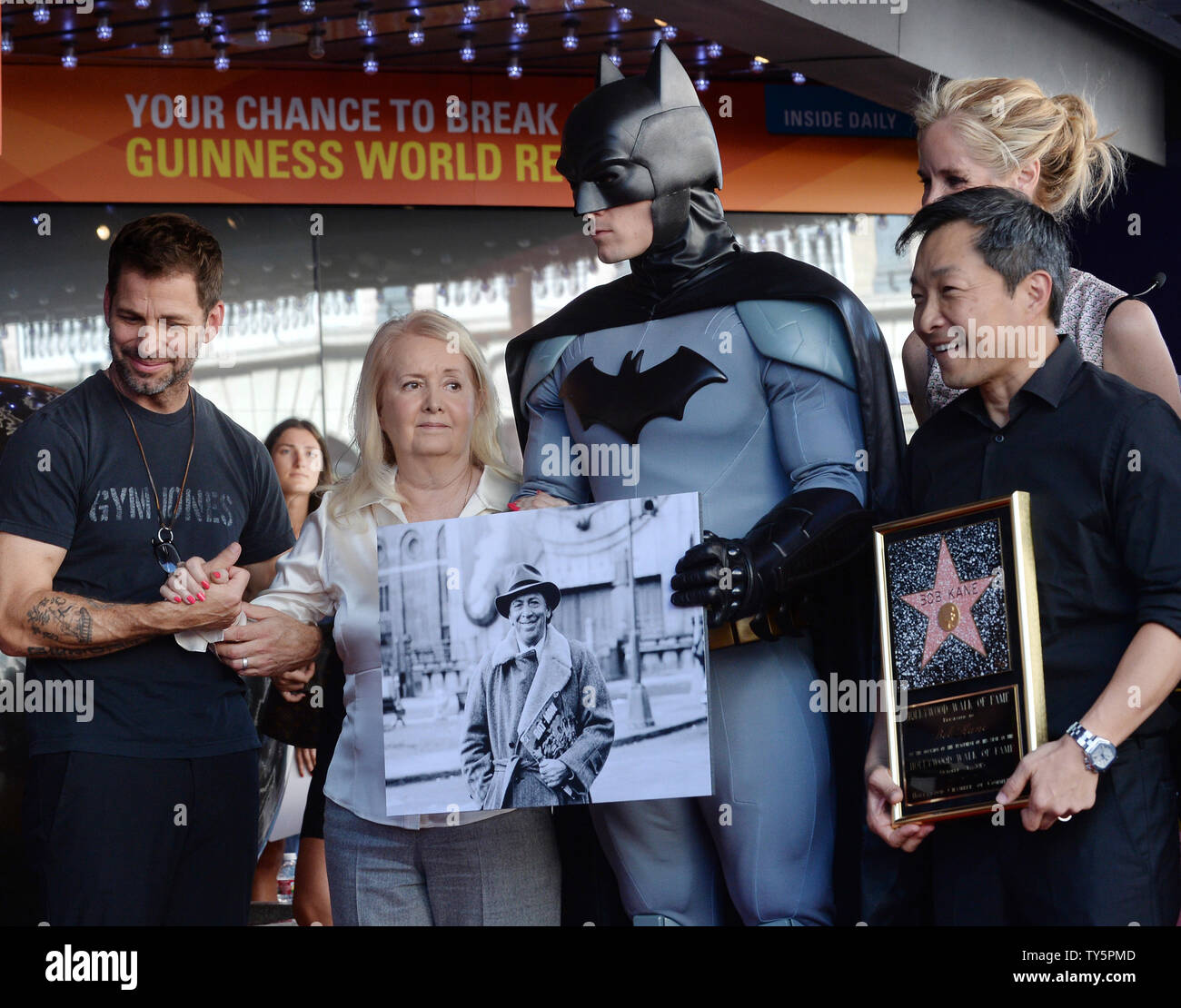 Elizabeth Sanders (2nd-L), the widow of "Batman" creator, the late Bob ...