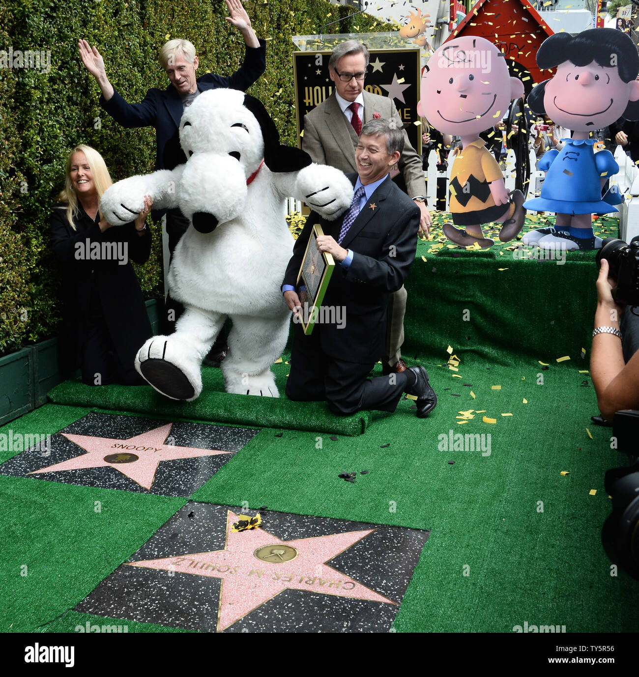 "Peanuts" character Snoopy reacts during an unveiling ceremony after ...