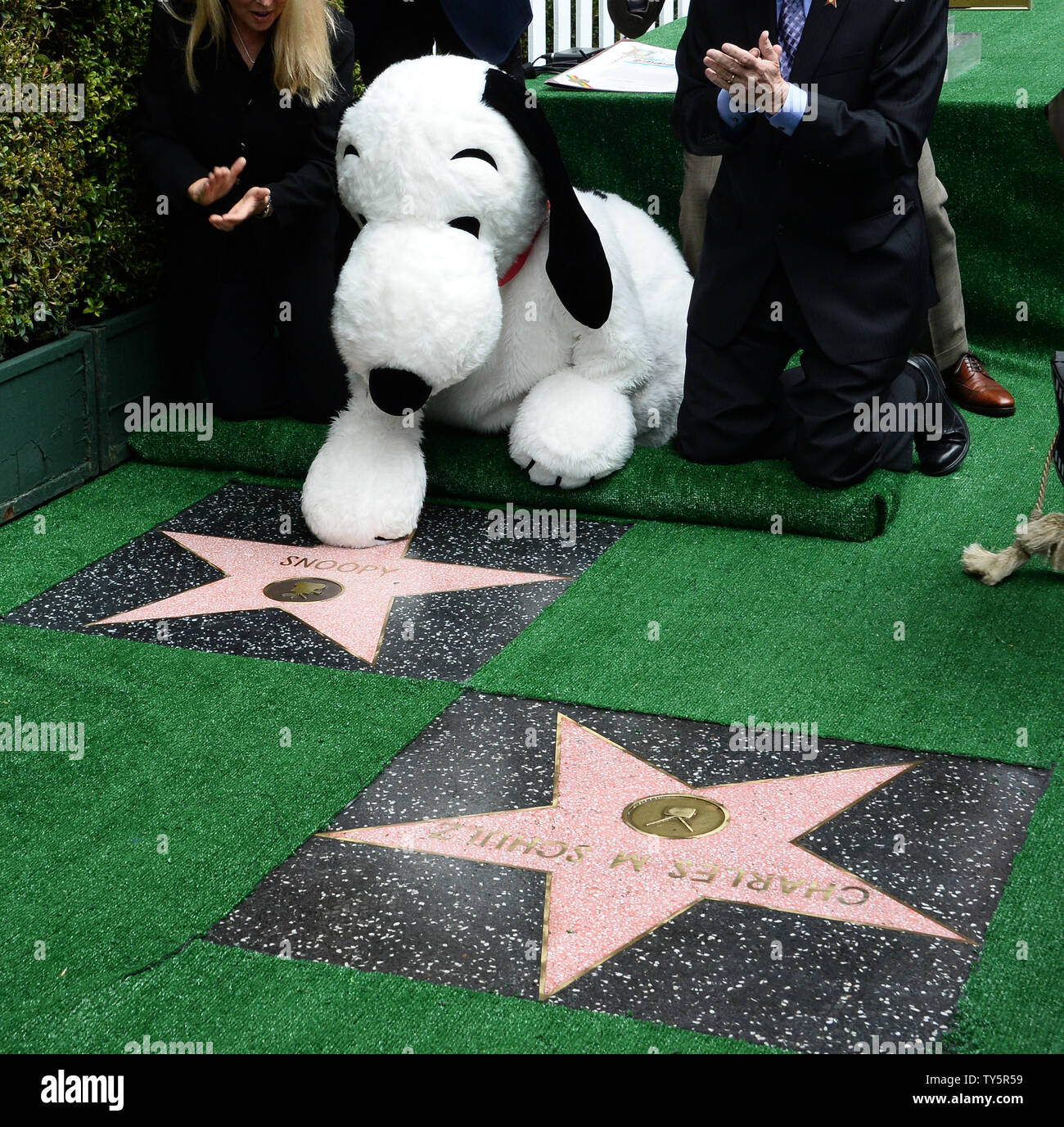 "Peanuts" character Snoopy reacts during an unveiling ceremony after ...