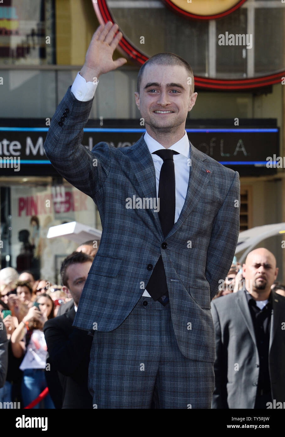 English actor Daniel Radcliffe waves during an unveiling ceremony ...