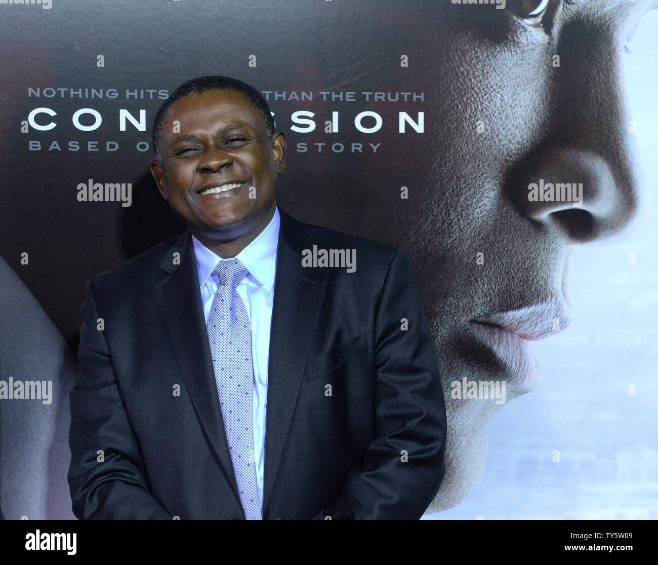 Dr. Bennet Omalu attends a screening of the motion picture sports drama ...