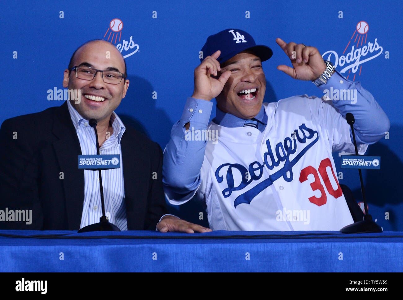 Dave Roberts (R), a former Dodger is introduced as the 10th manager of ...