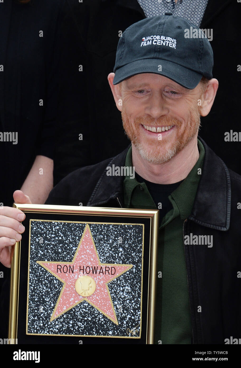 Director and actor Ron Howard holds a replica plaque during an ...