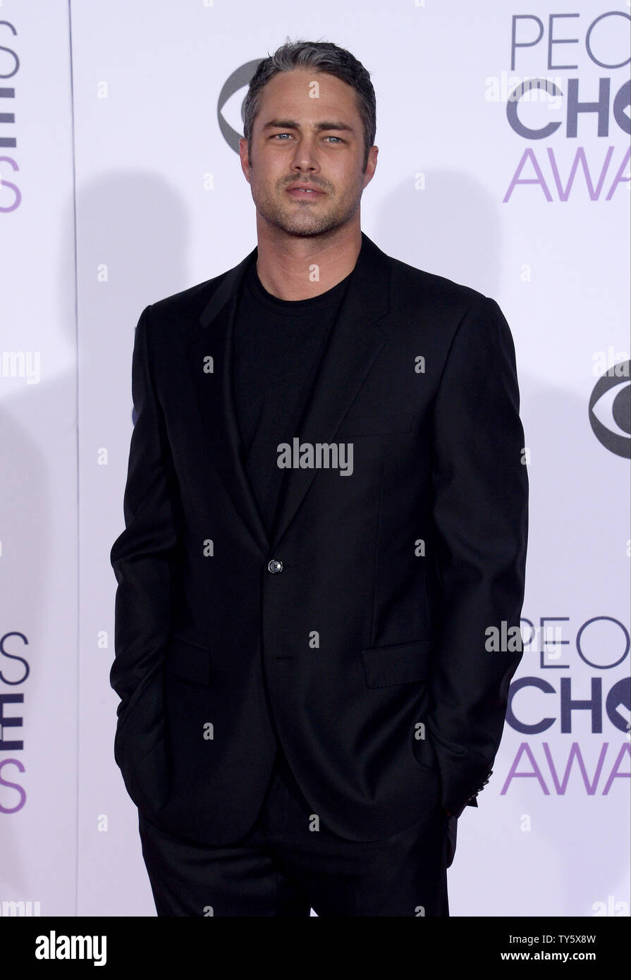 Actor Taylor Kinney arrives for the 42nd annual People's Choice Awards ...