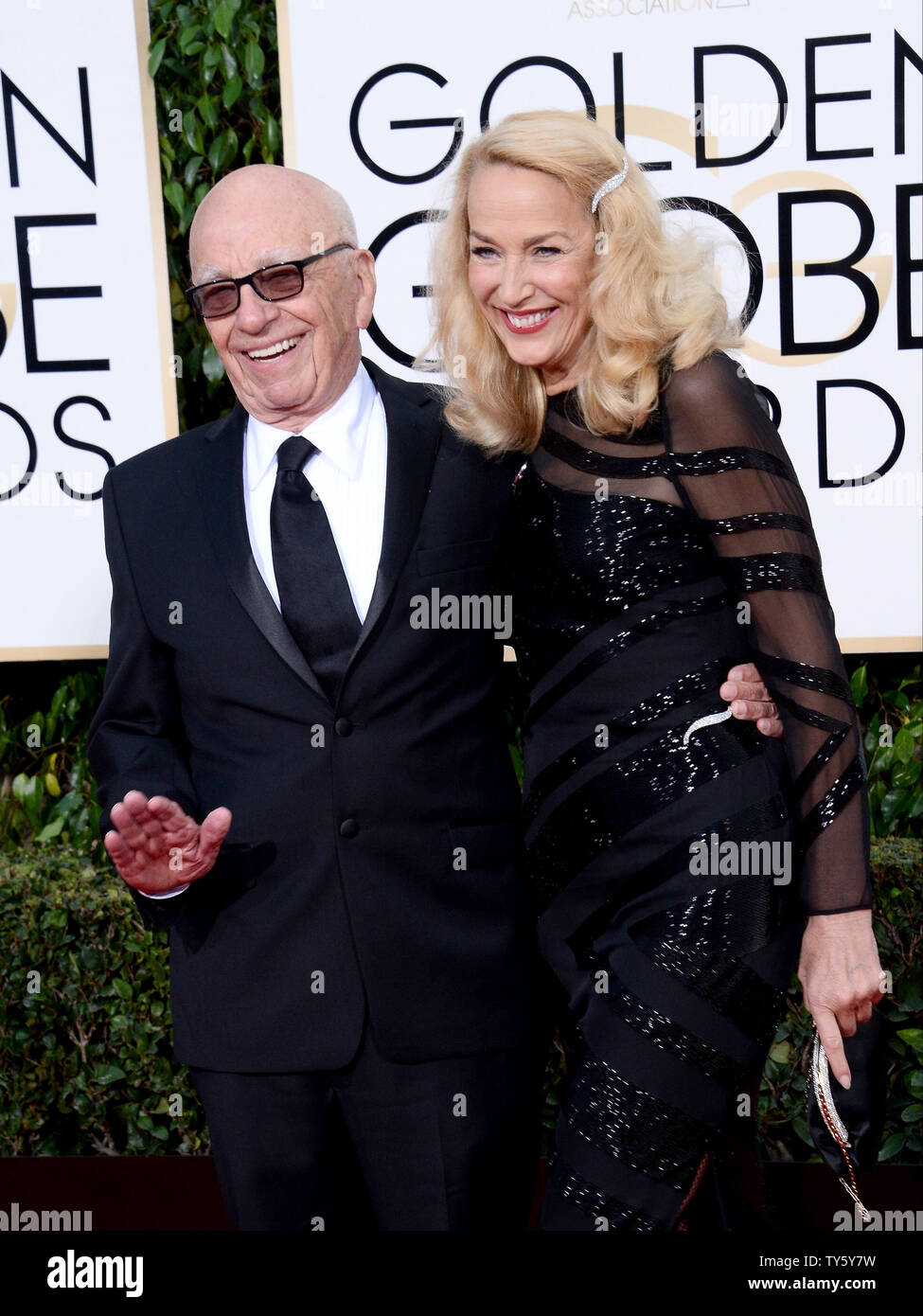 News Corp. CEO Rupert Murdock, left, and model Jerry Hall attend the ...