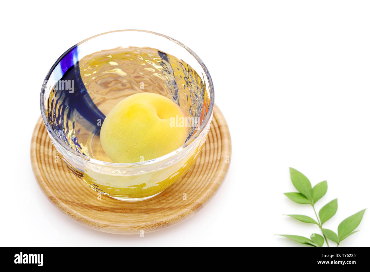 Japanese plum wine called umeshu on white background Stock Photo - Alamy