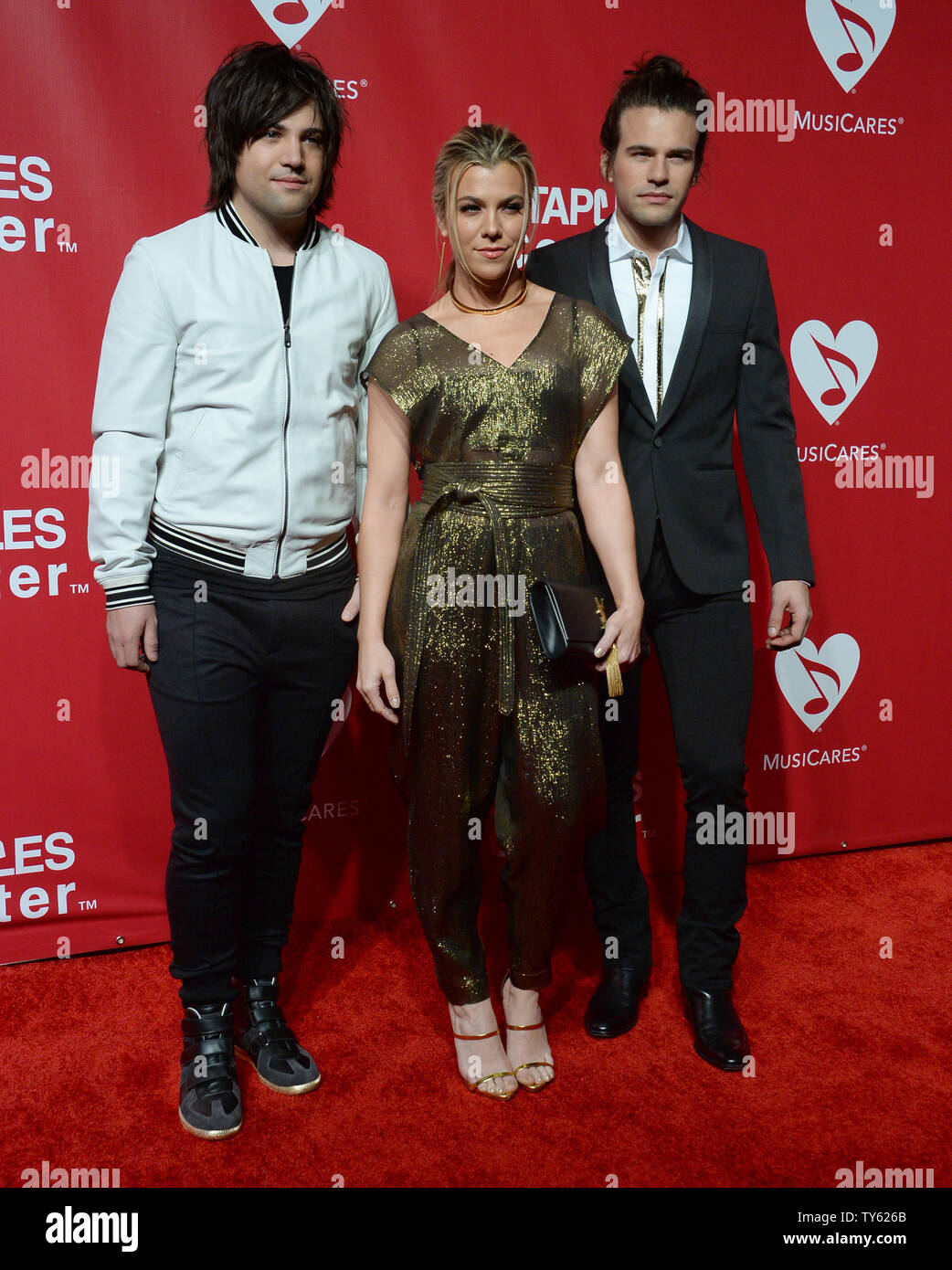 Musicians Neil Perry, Kimberly Perry and Reid Perry (L-R) of The Band ...