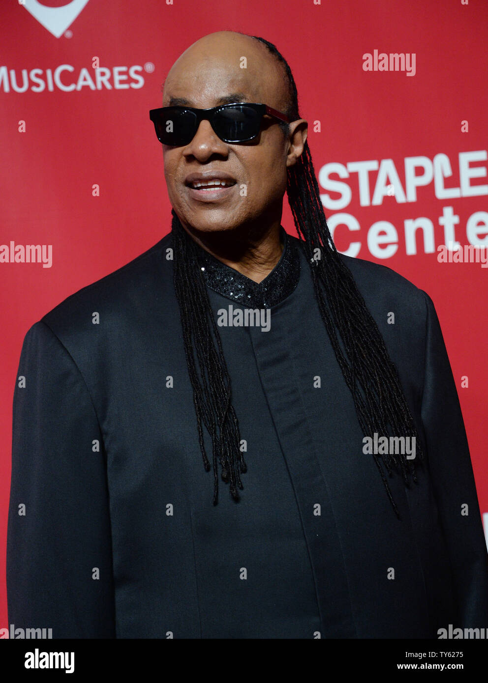 Singer Stevie Wonder arrives for the MusiCares Person of the Year gala ...